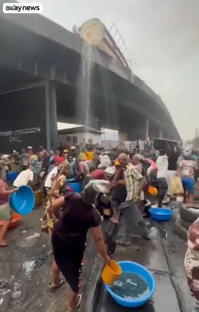 Residents Scoop Diesel After Tanker Falls On Liverpool Bridge In Lagos ...